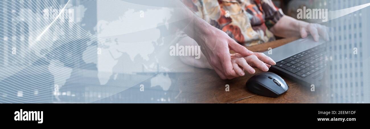 Old woman learning to use a laptop. panoramic banner Stock Photo - Alamy