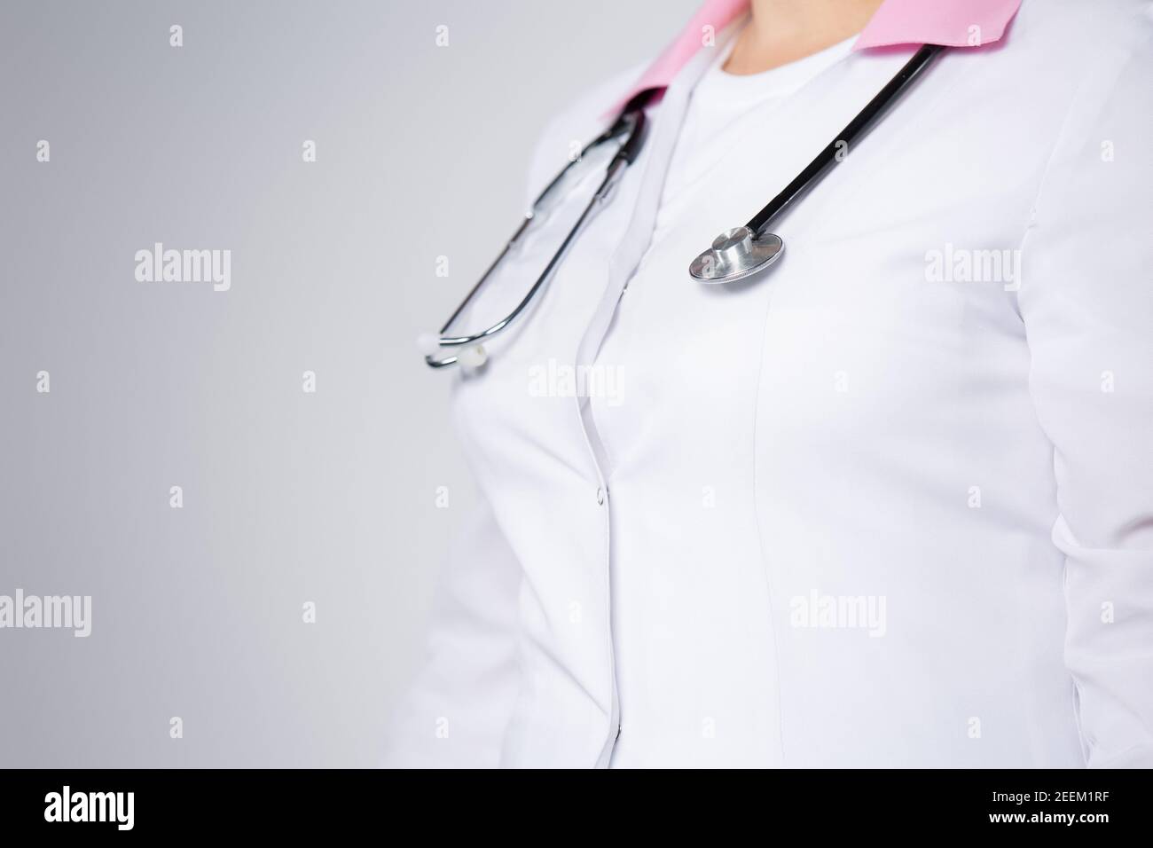 Cropped view of female doctor posing with stethoscope. Health care ...