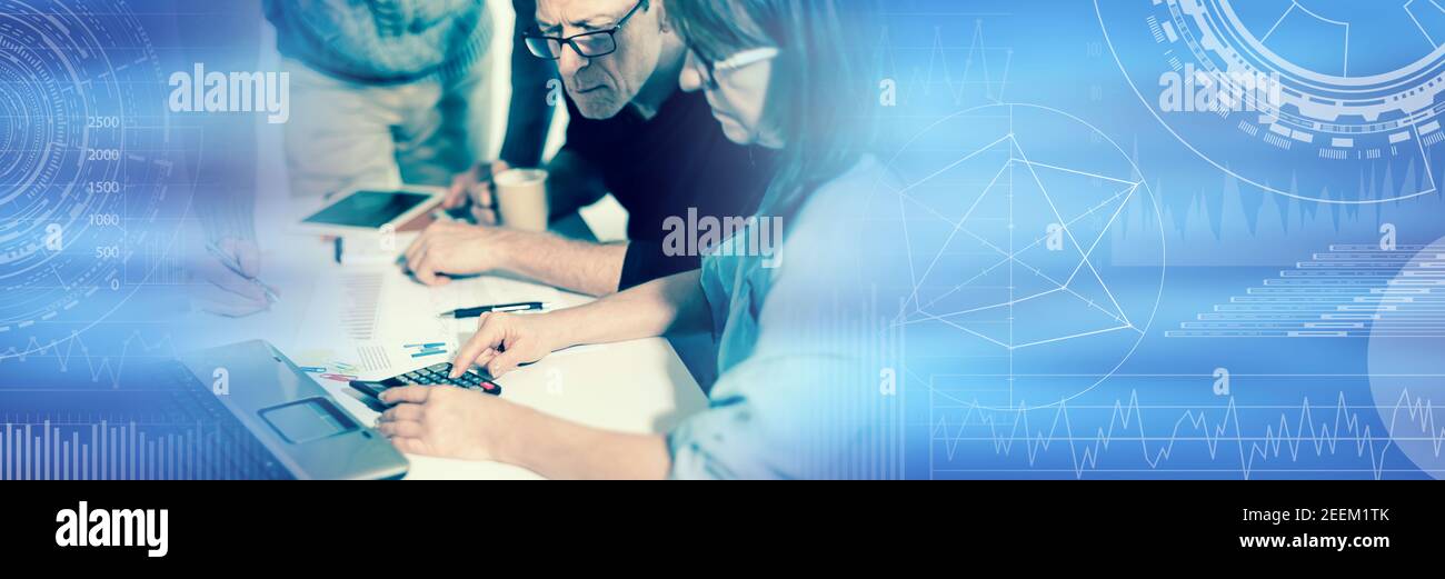 Business people working together in office, post processing; panoramic ...