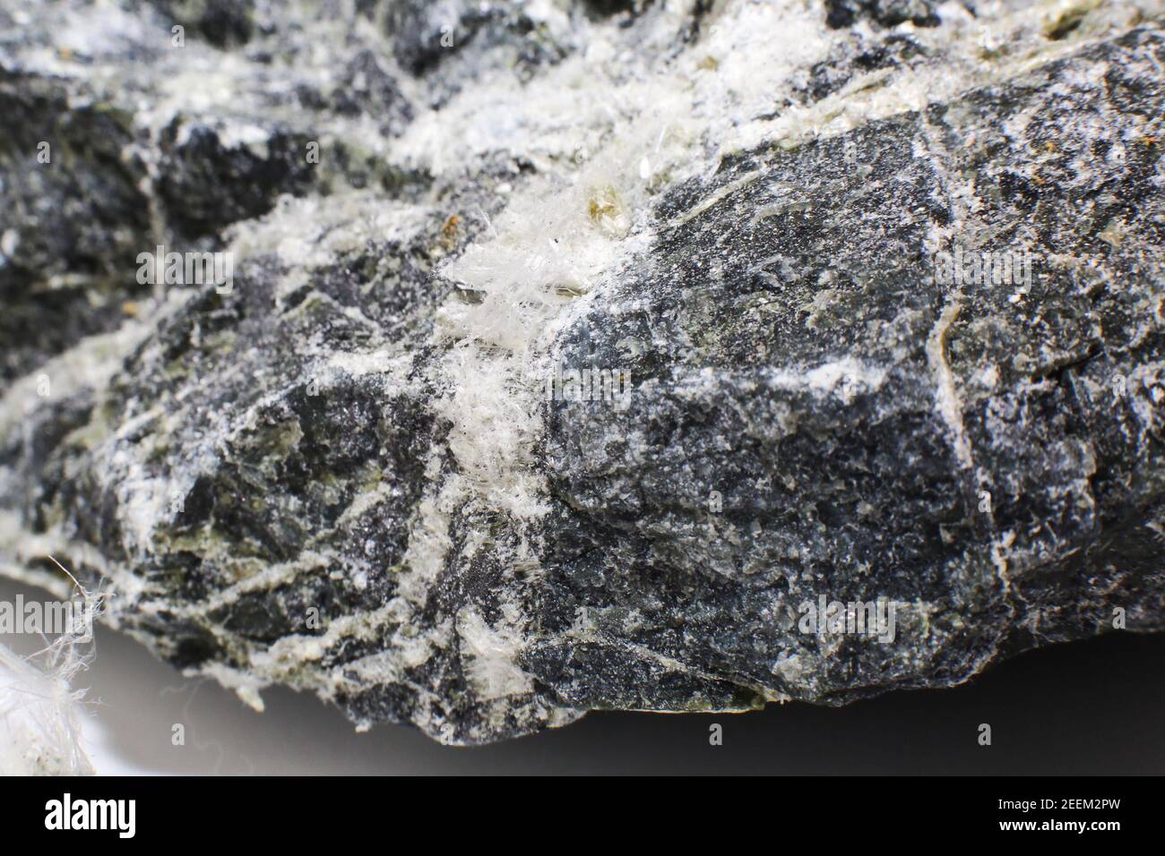 White fibers of asbestos mineral in stone, close-up Stock Photo - Alamy