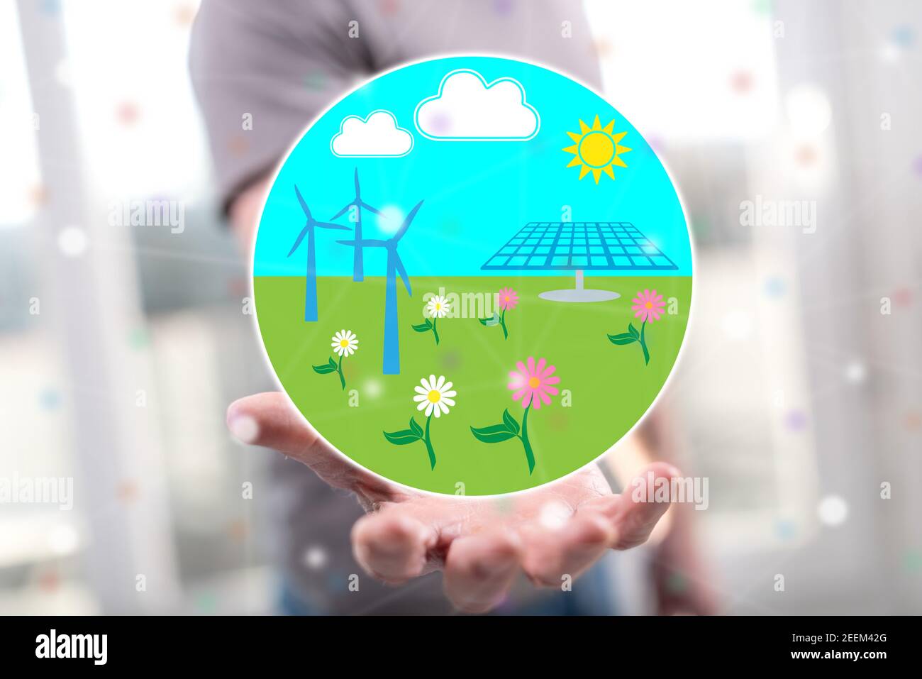 Clean energy concept above the hand of a man in background Stock Photo ...