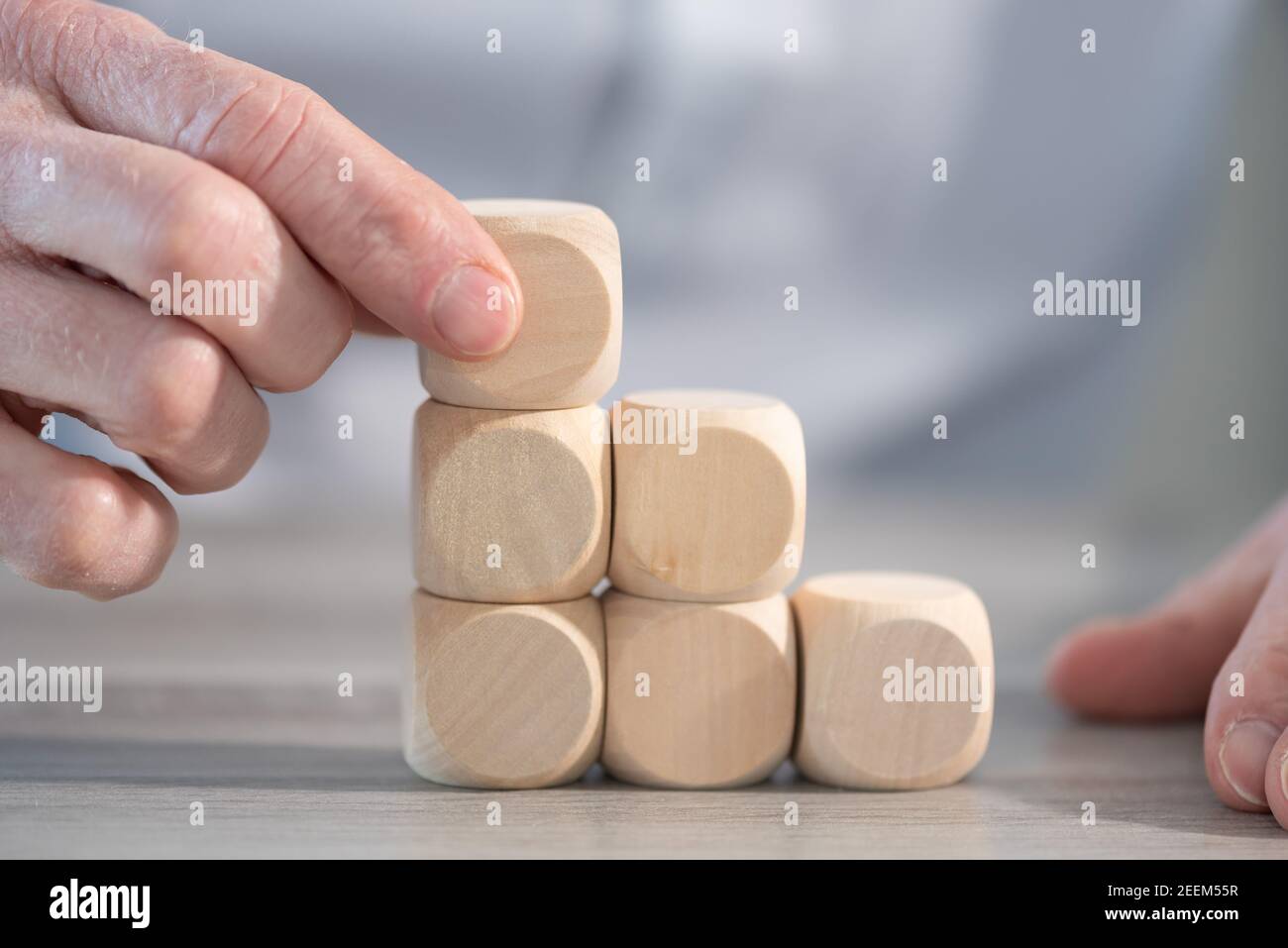 Concept of business development with wooden cubes Stock Photo - Alamy
