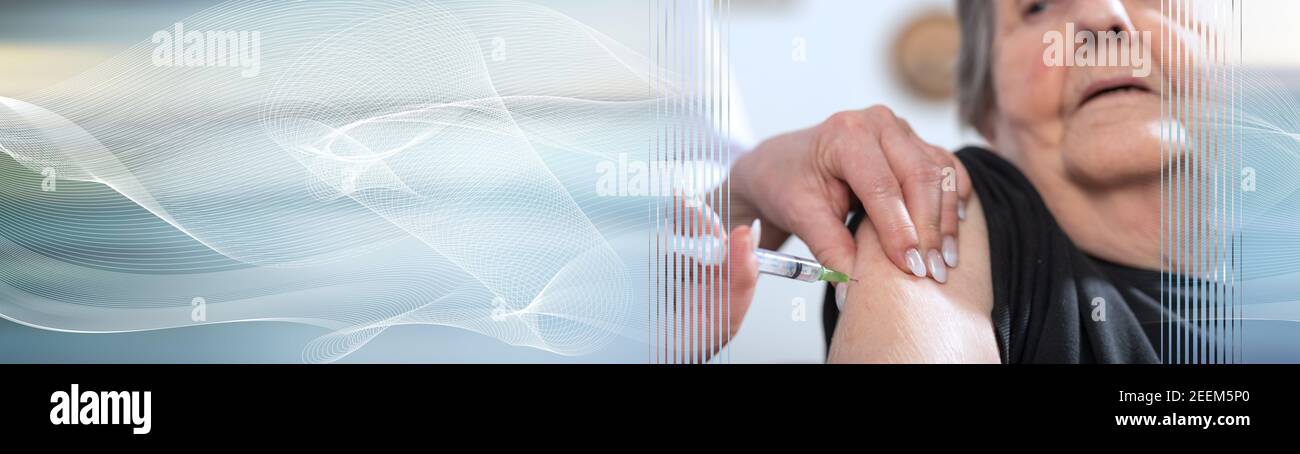 Nurse giving an injection to senior woman; panoramic banner Stock Photo ...