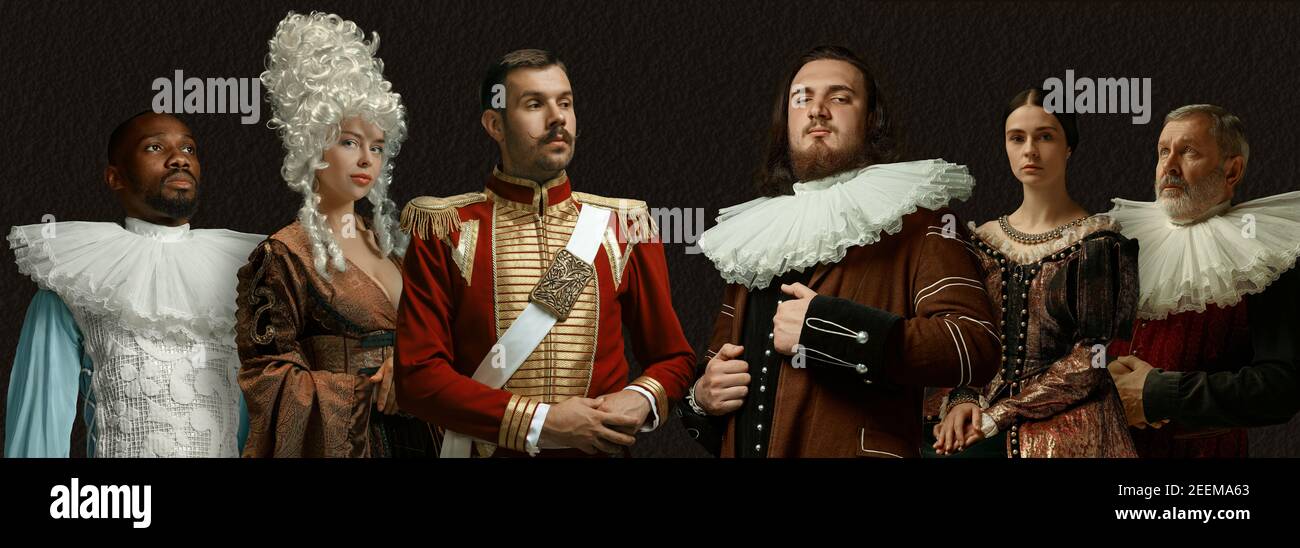 Composed and confident. Medieval people as a royalty persons in vintage ...