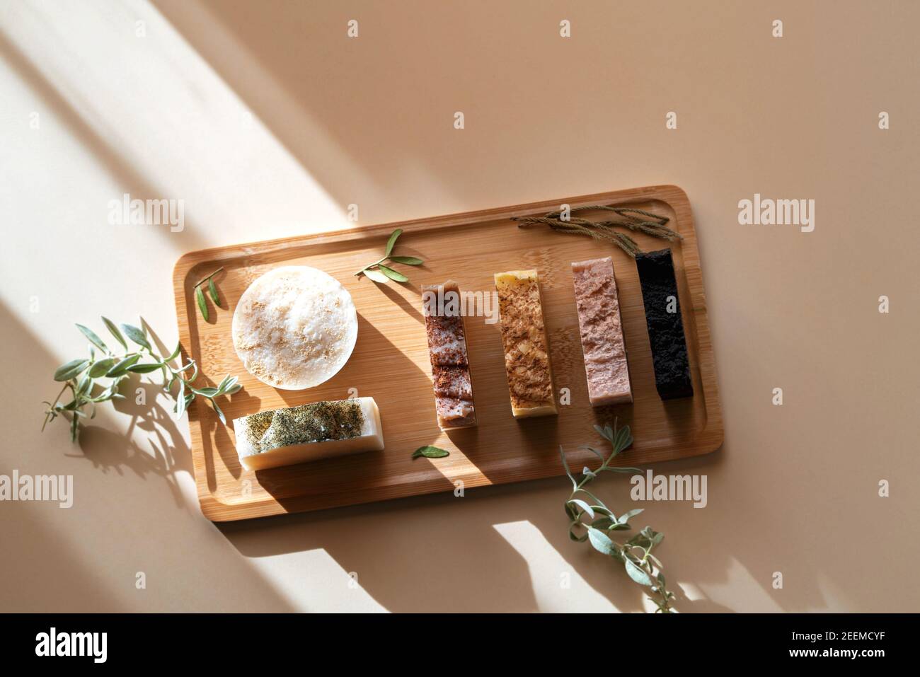 Wooden tray with handmade soap from natural ingredients. Warm ...