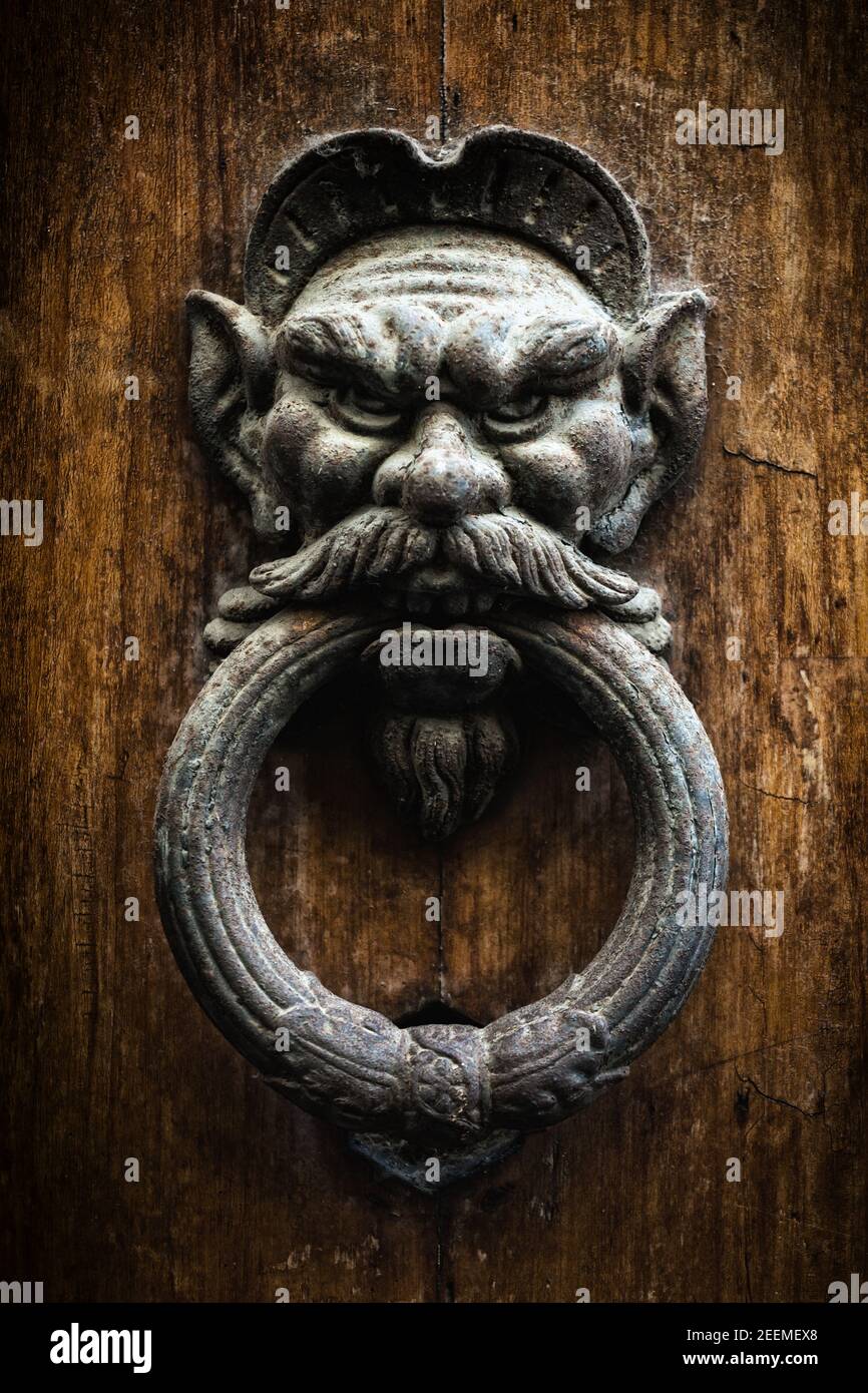 Wrought iron handle used for knocking. Typical handles of the medieval ...