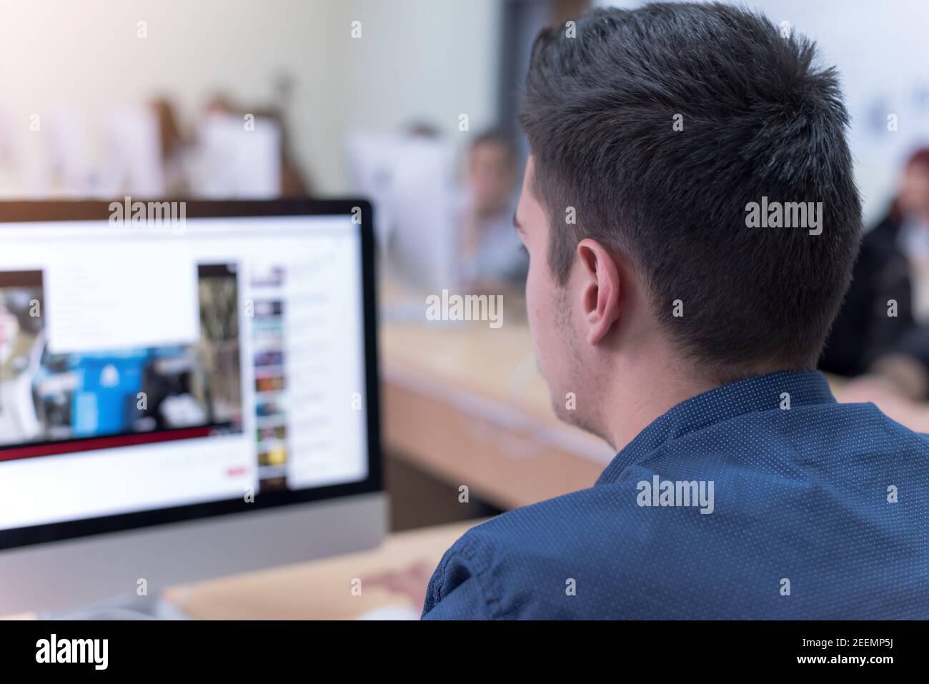 Group of muttiethnic IT students working at their computer lab. Group ...