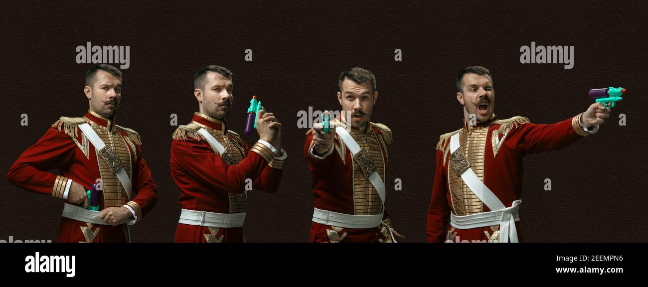 Gangster with toy gun. Medieval man as a royalty person in vintage ...