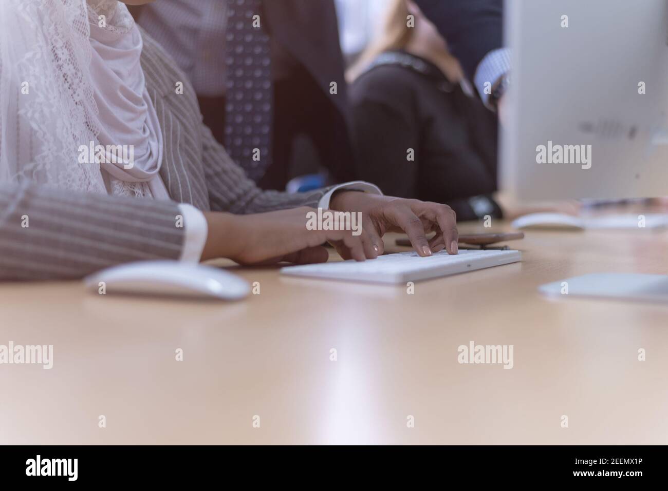 Woman tapping fingers on desk hi-res stock photography and images - Alamy