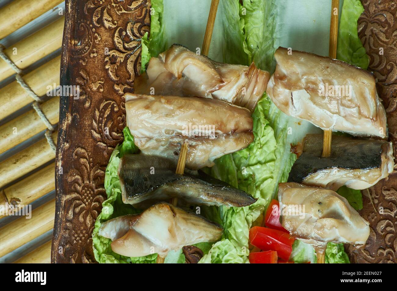 Moroccan Grilled Fish Kebabs, sprinkle seasoning all over skewers Stock ...