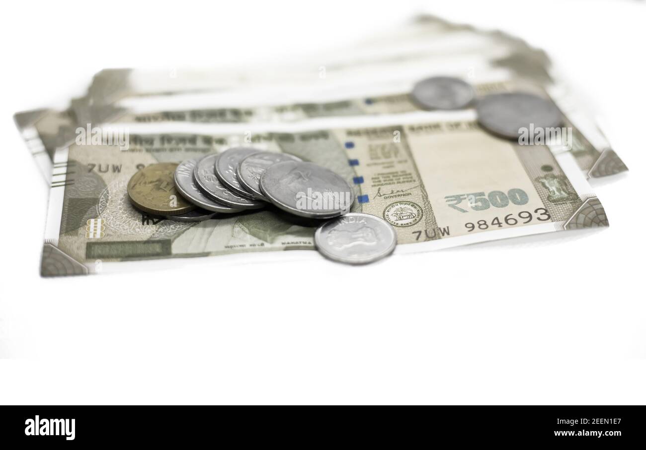 Some Indian cash money and coins on the white background Stock Photo ...