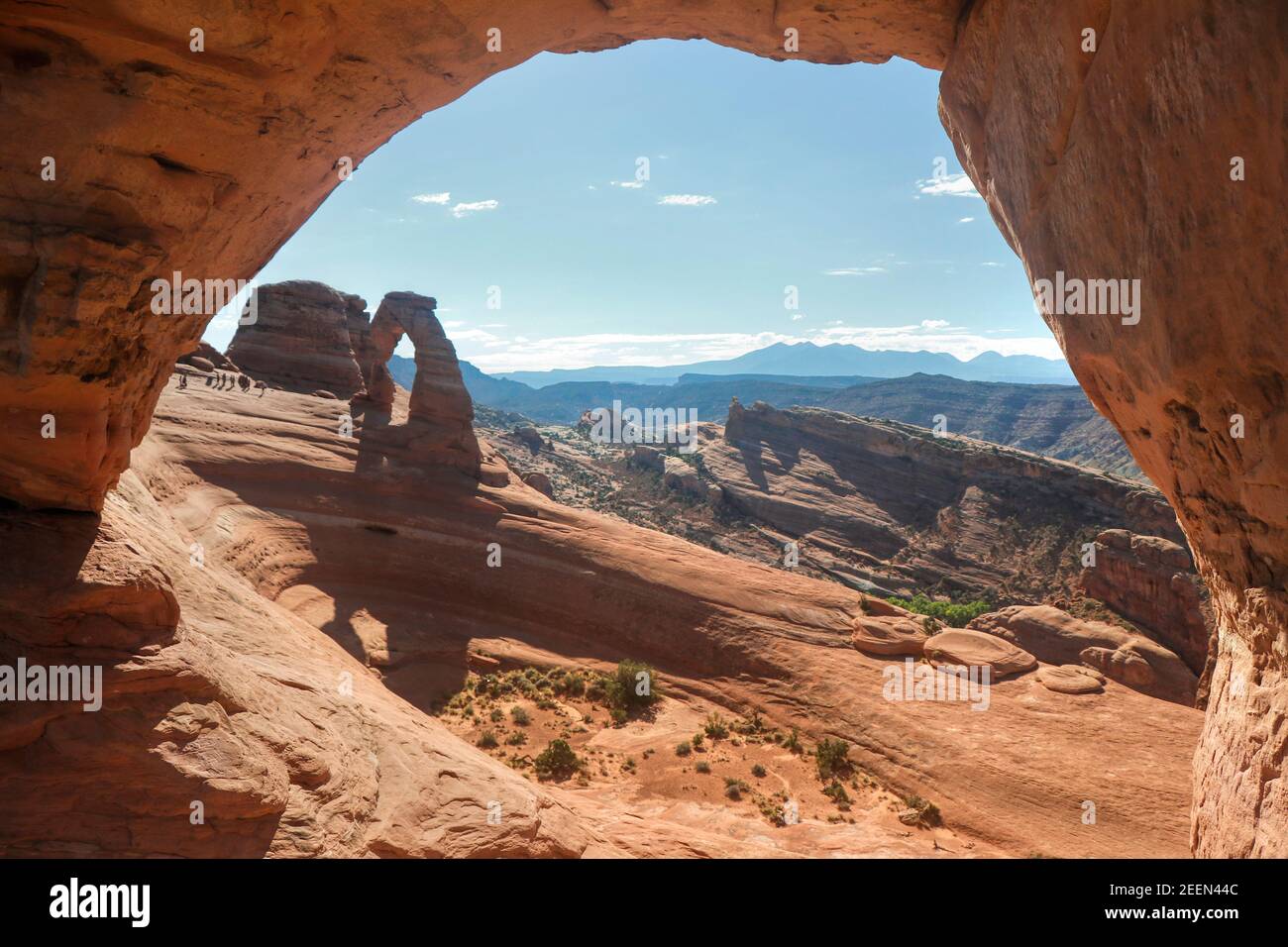 View of Delicate Arch from a small opening in the rock during the ...