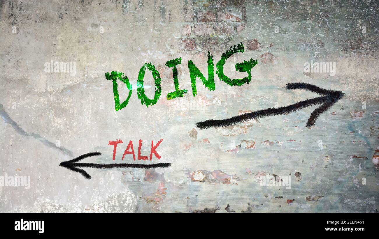 Street Sign the Direction Way to Doing versus Talk Stock Photo - Alamy