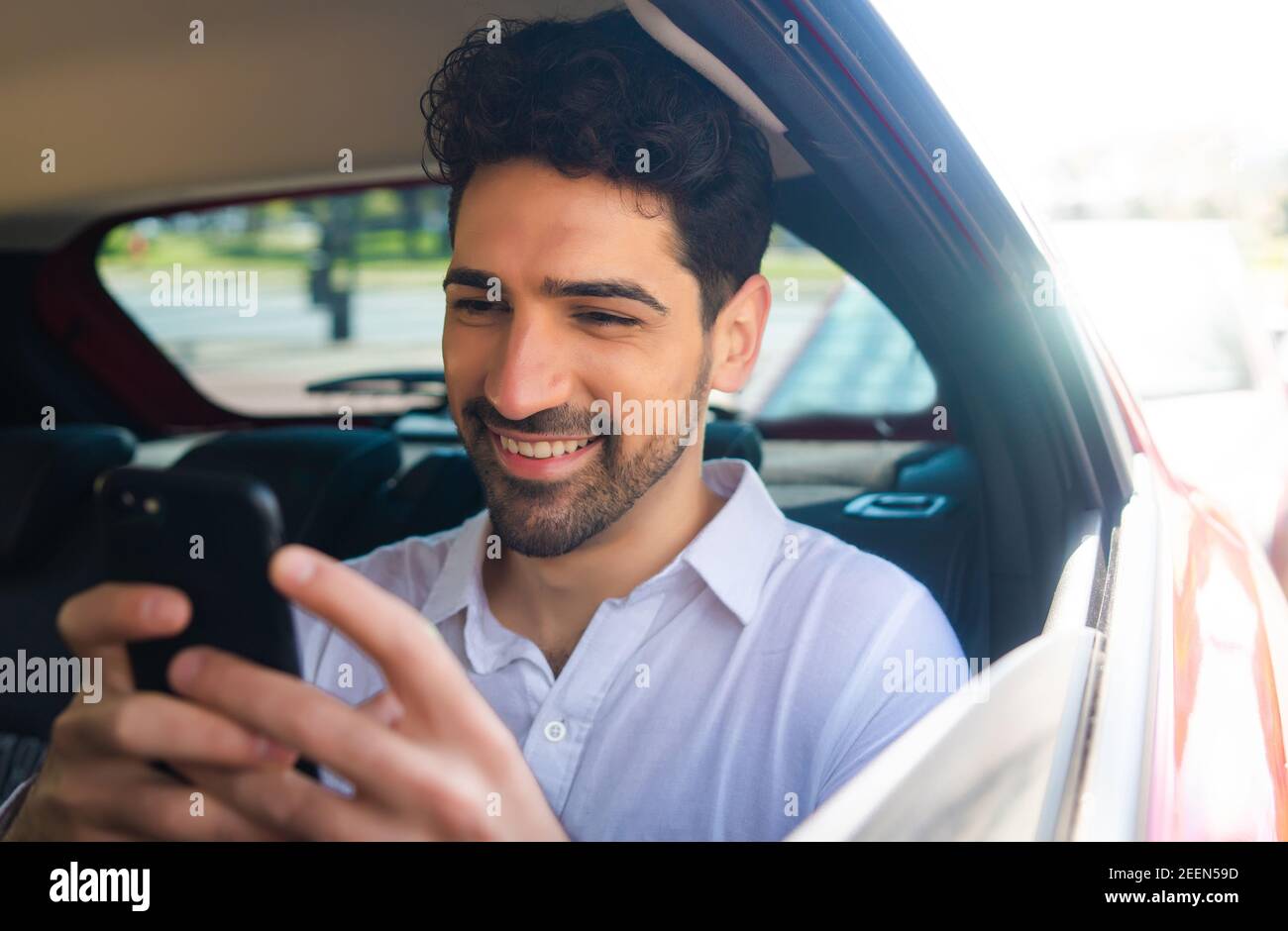 Businessman sitting in cab hi-res stock photography and images - Alamy