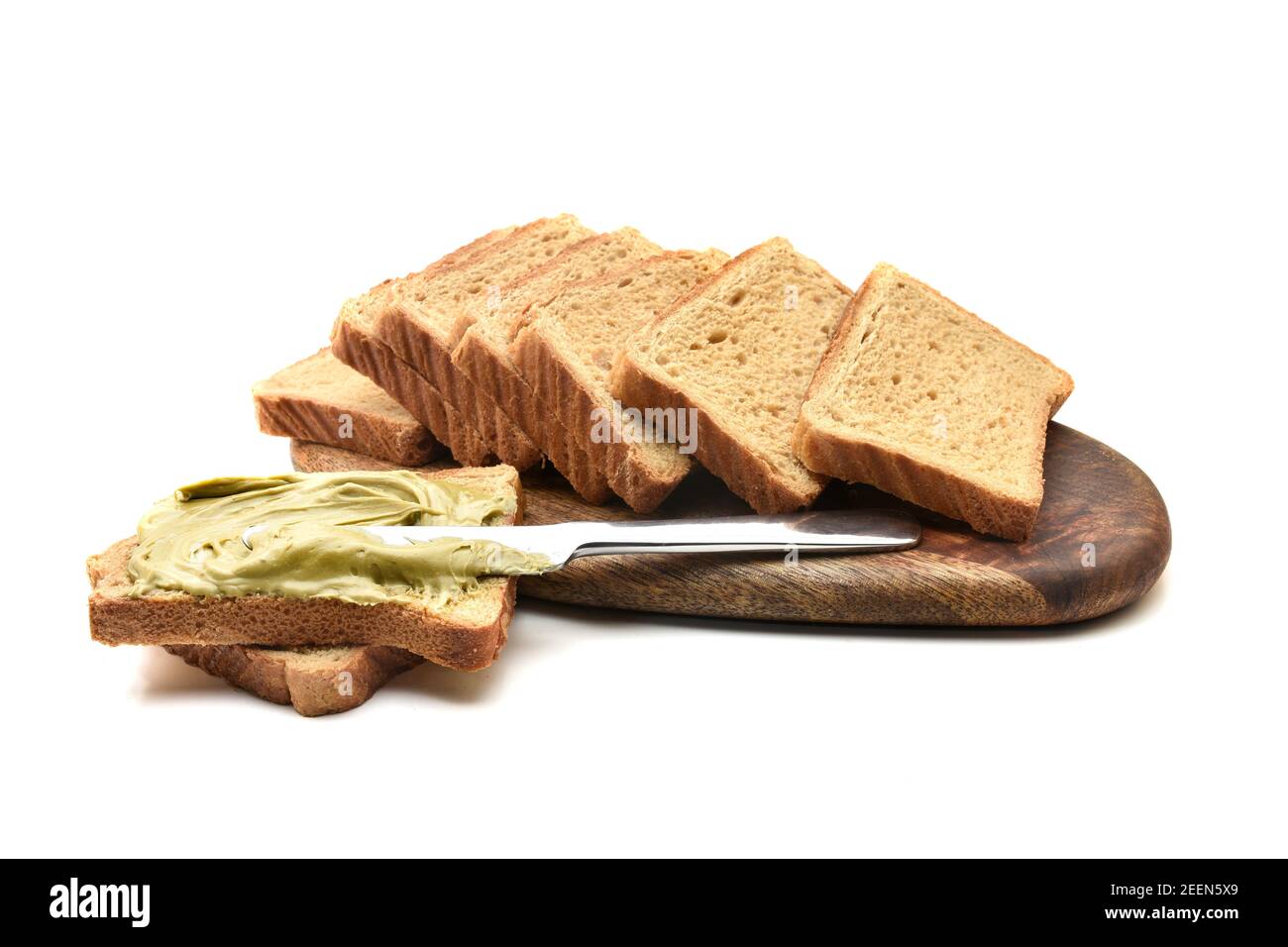 toast with pistachio cream lying on plain toasts isolated on white ...