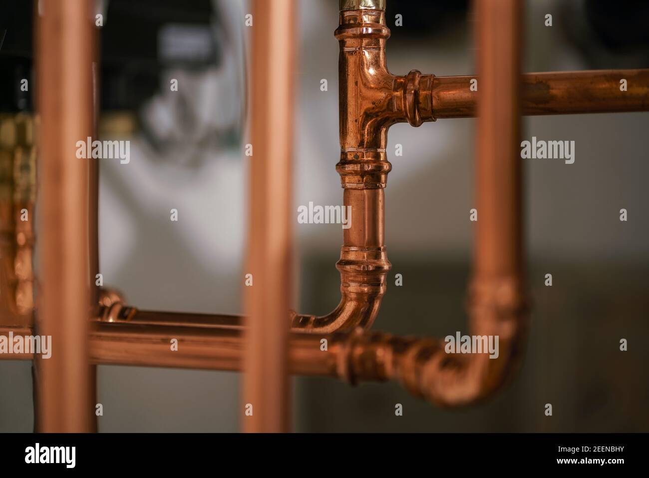 New nd shiny copper water pipes Stock Photo - Alamy