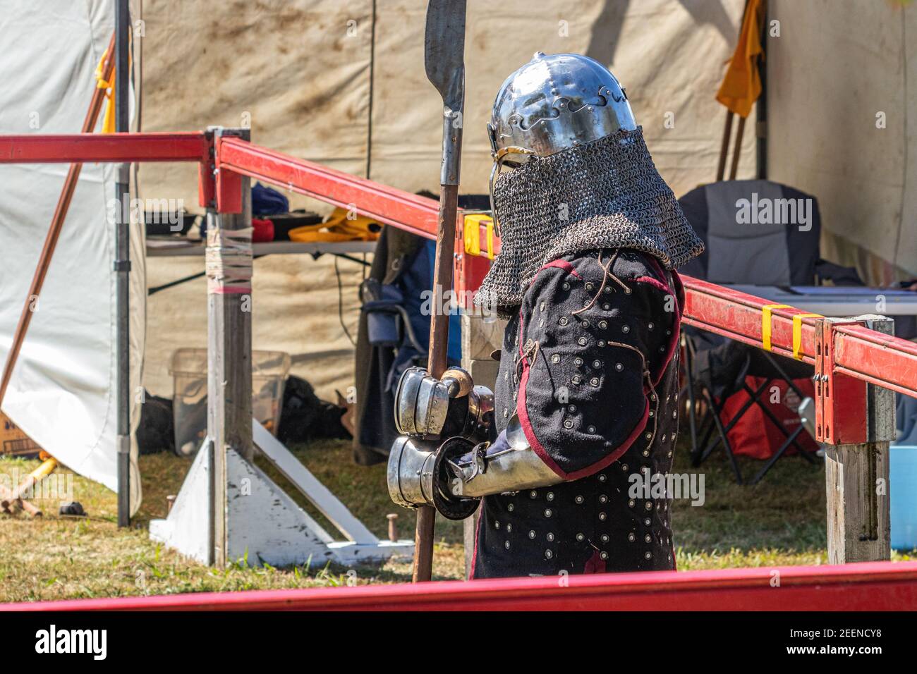 Medieval Enactor preparing for battle Stock Photo - Alamy