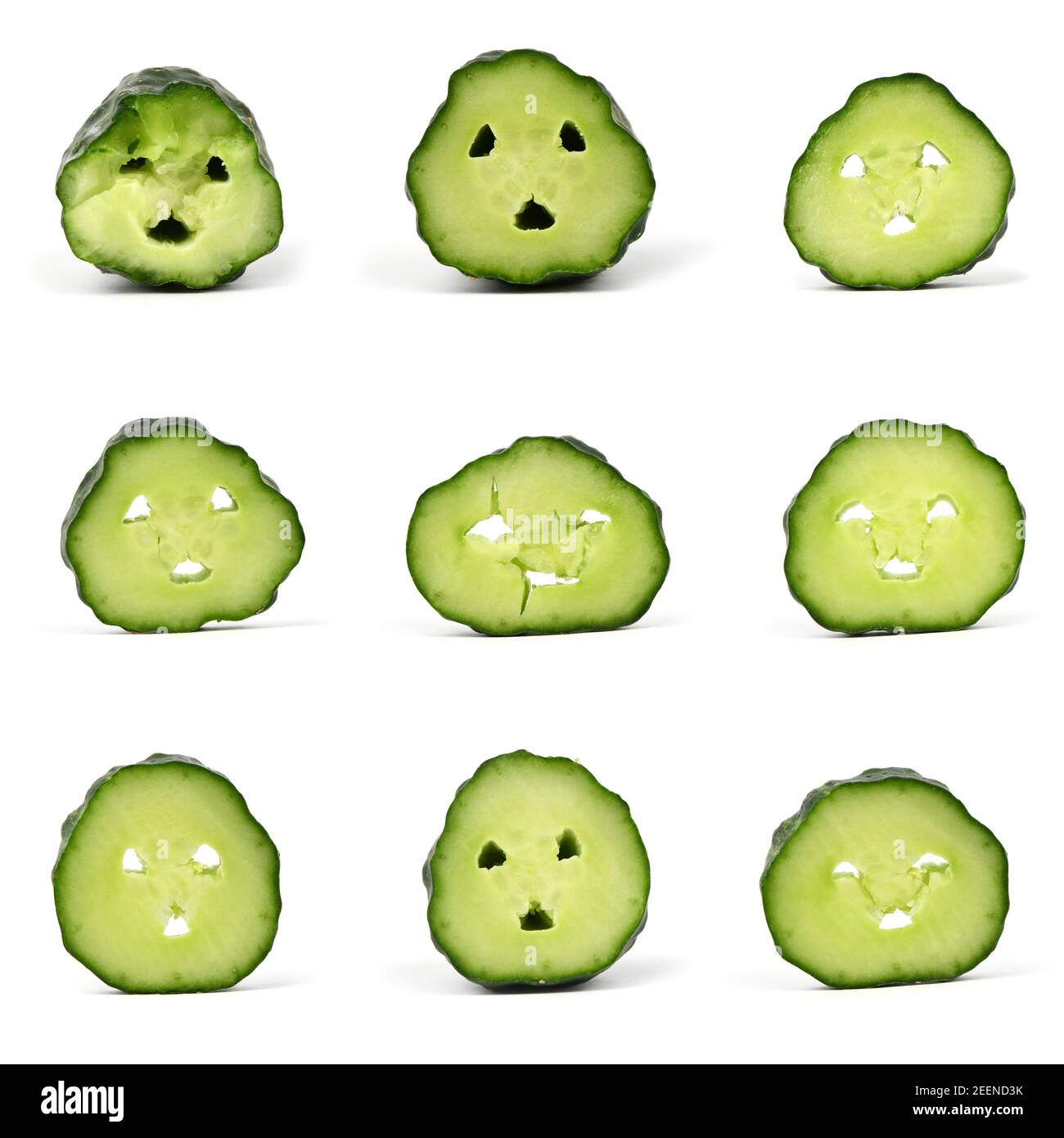 Nine fresh slice cucumber cut in the form of emoticon smiling. Ioslated ...
