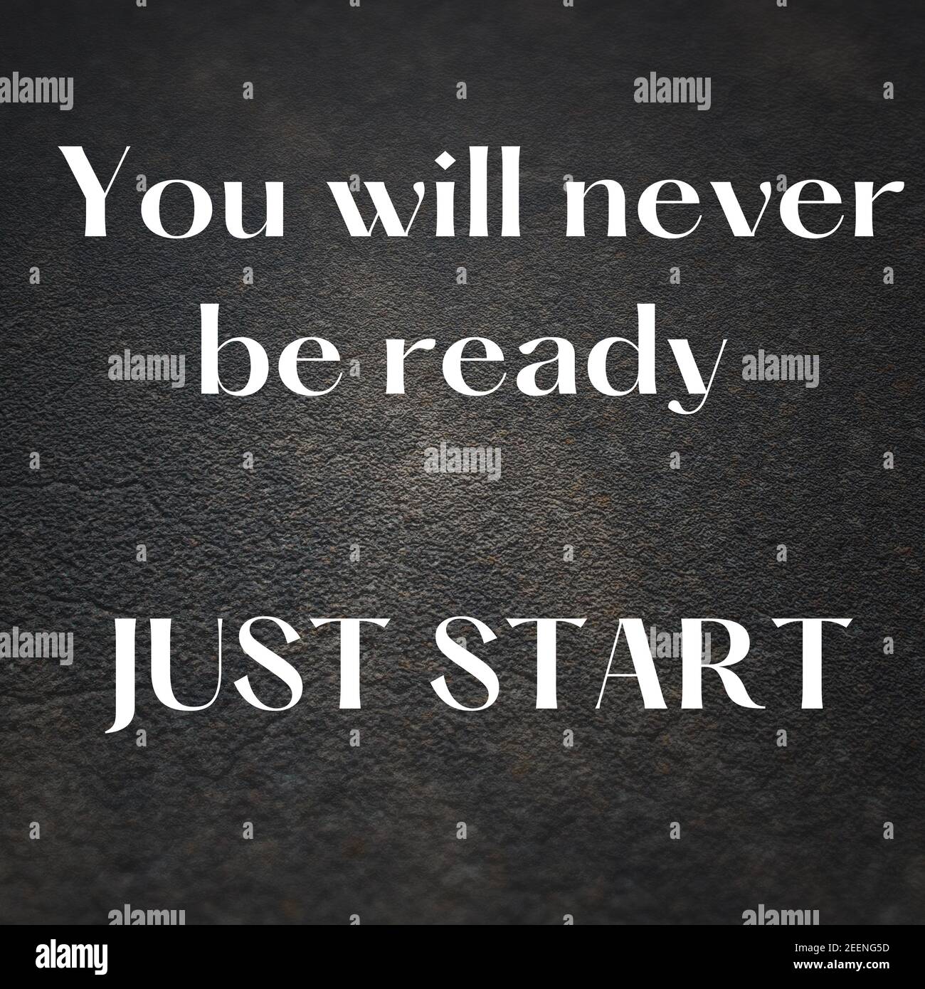 Motivational quote "You will never be ready, just start" on concrete ...