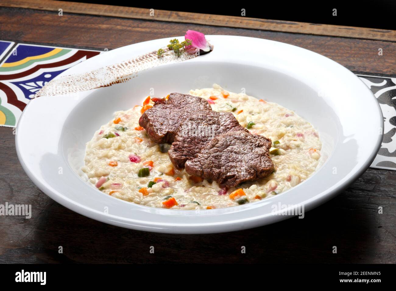 Risotto with roasted meat Stock Photo - Alamy