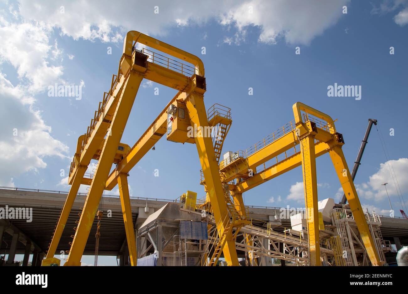 Yellow Gantry Bridge Crane for Cargo and Construction Stock Photo - Alamy