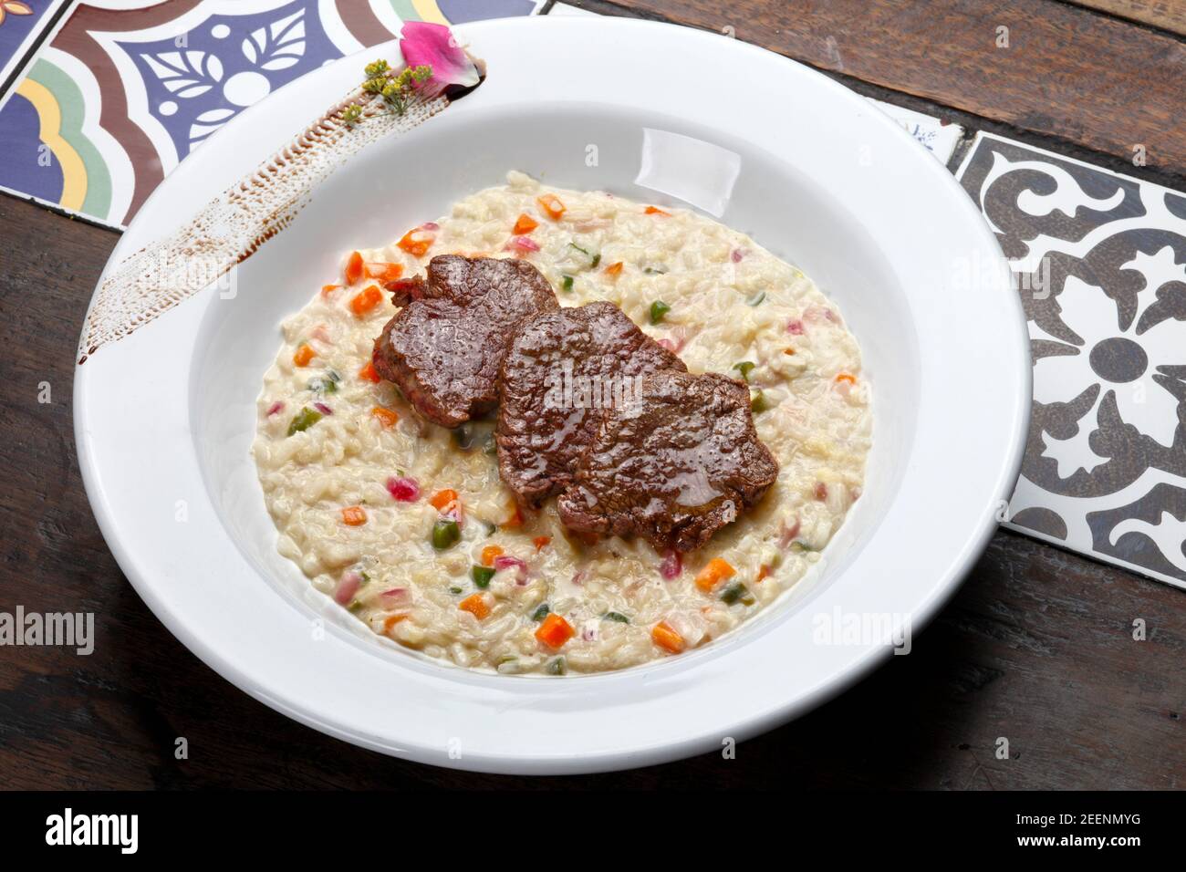 Risotto with roasted meat Stock Photo - Alamy
