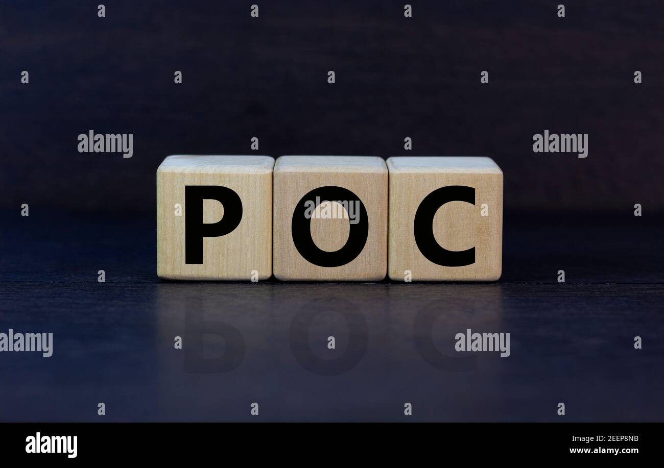 POC, people of color symbol. Wooden cubes with the word POC, people of ...