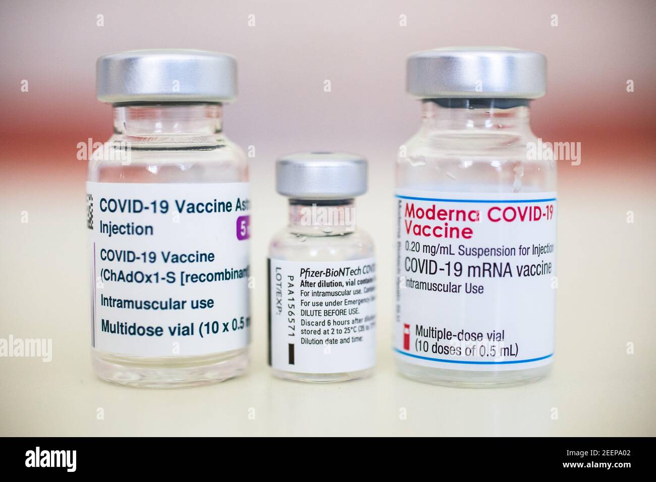 In this photo illustration vials containing Pfizer-BioNtech, Moderna ...