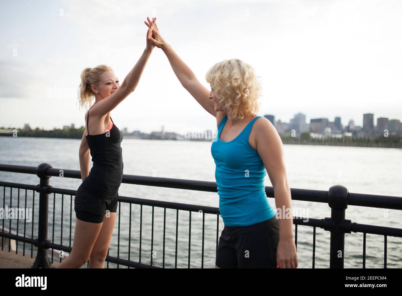Clapping blonde hi-res stock photography and images - Alamy