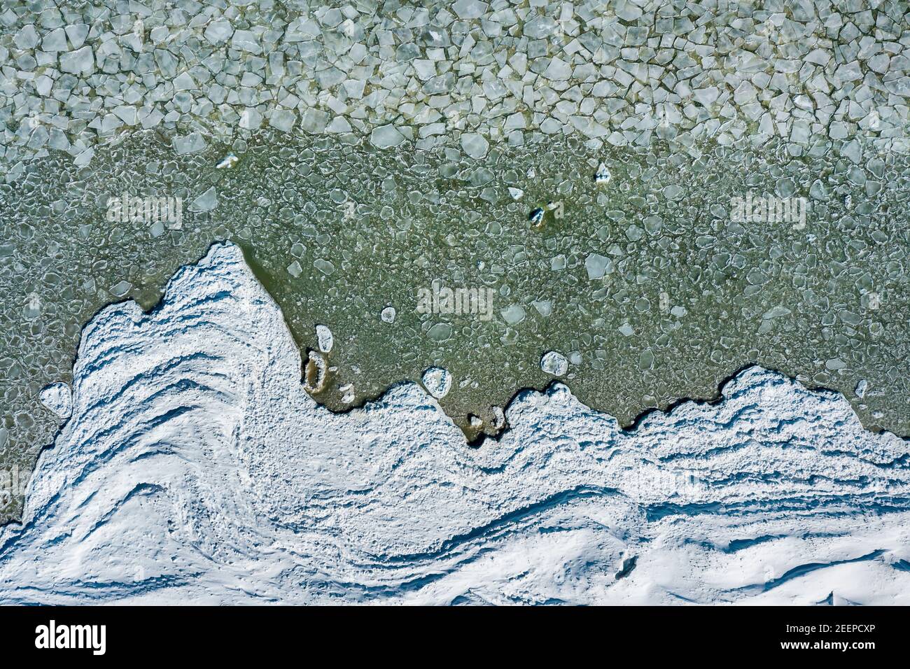 Aerial top-down view of an icy Lake Michigan near Glencoe Beach in the ...