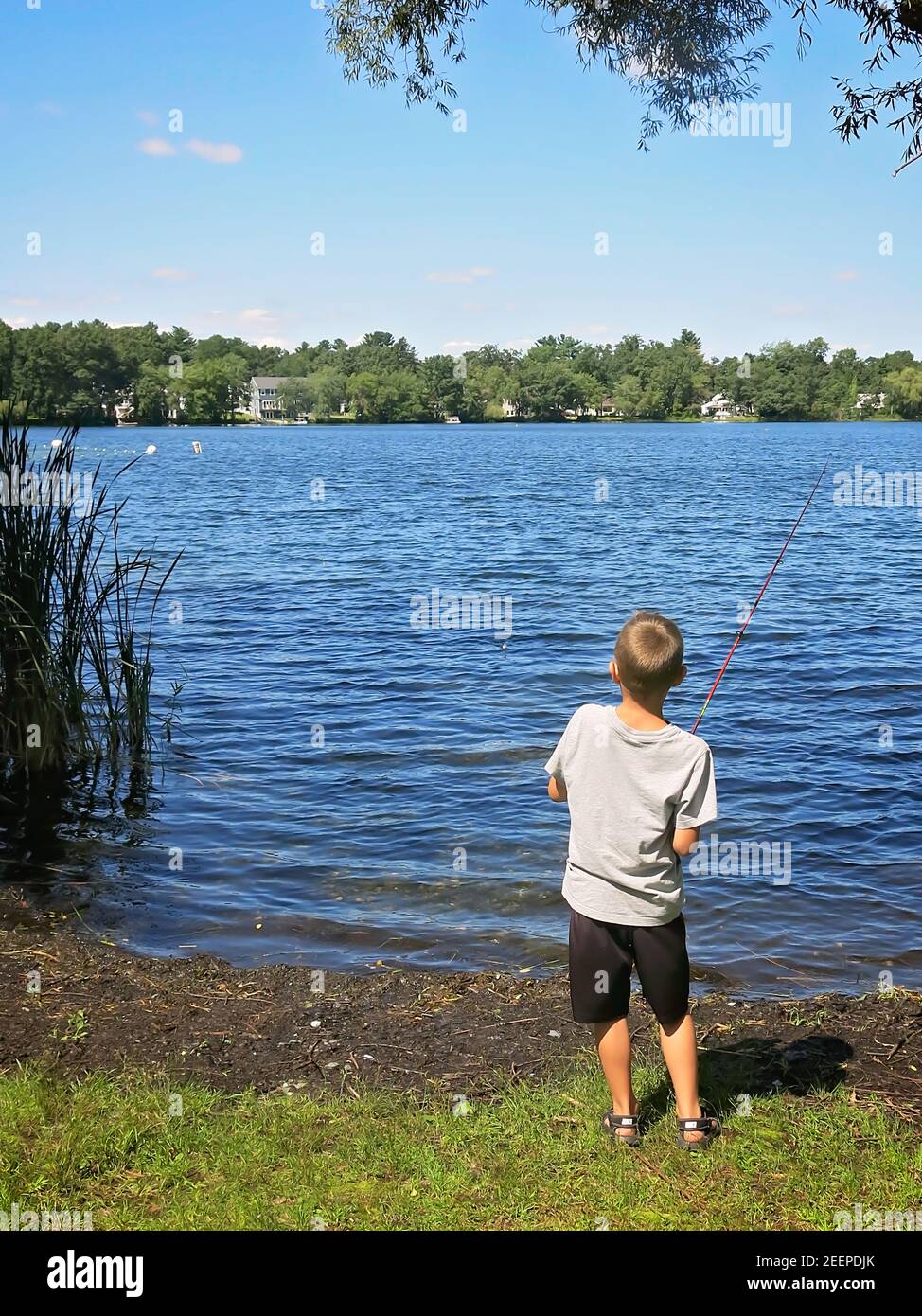Reeling in big fish hi-res stock photography and images - Alamy