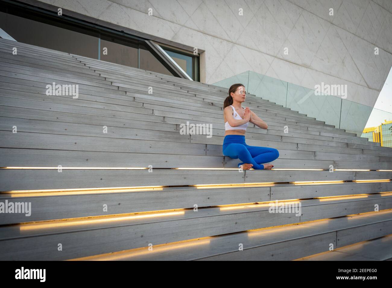 Woman practicing yoga steps hi-res stock photography and images - Alamy