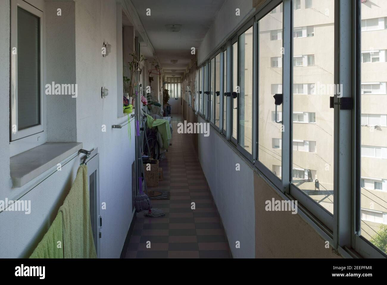 Exterior corridor connecting different apartments in low cost social ...