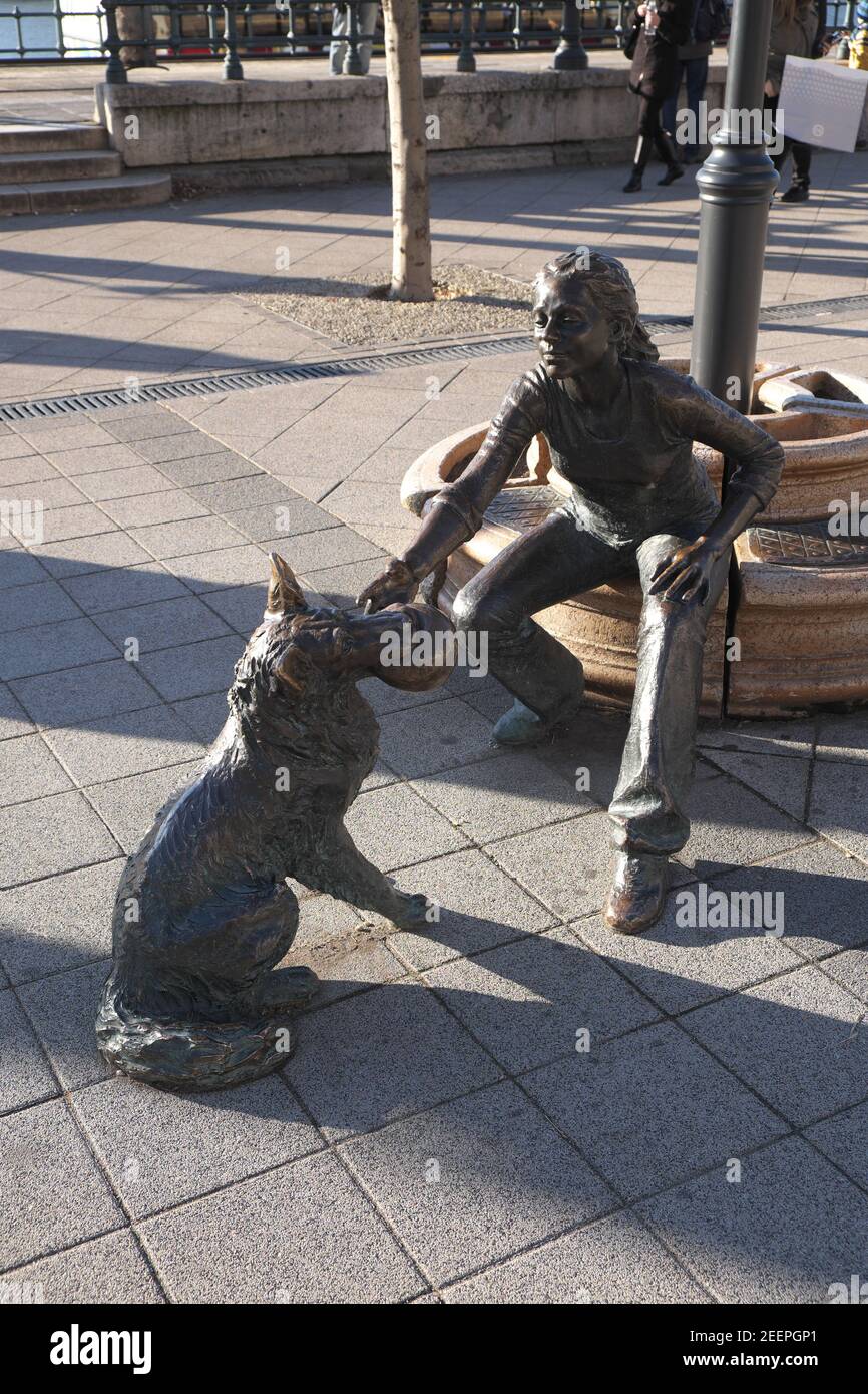 Sculpture of a girl with a dog, Jane Haining Rakpart, Budapest, Hungary ...