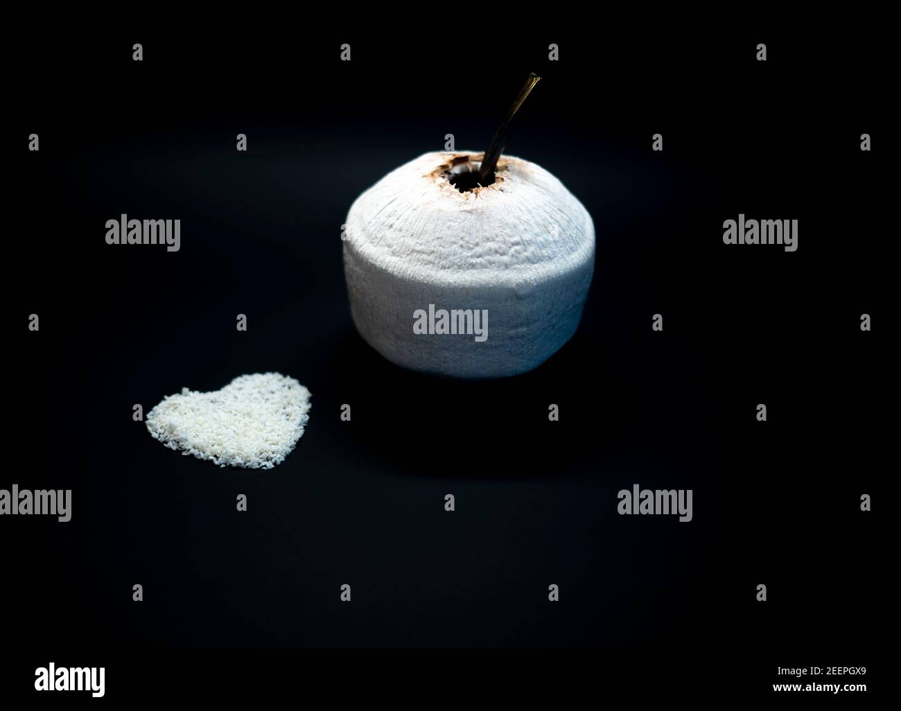 Peeled coconut with sustainable straw and coconut symbol heart Stock ...