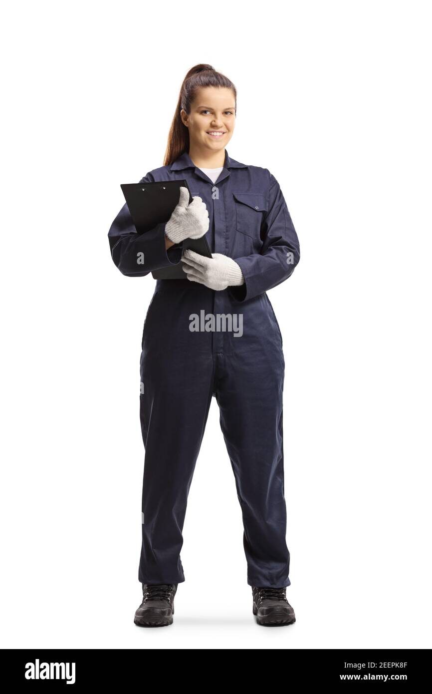 Full length portrait of a female mechanic in a uniform standing and ...