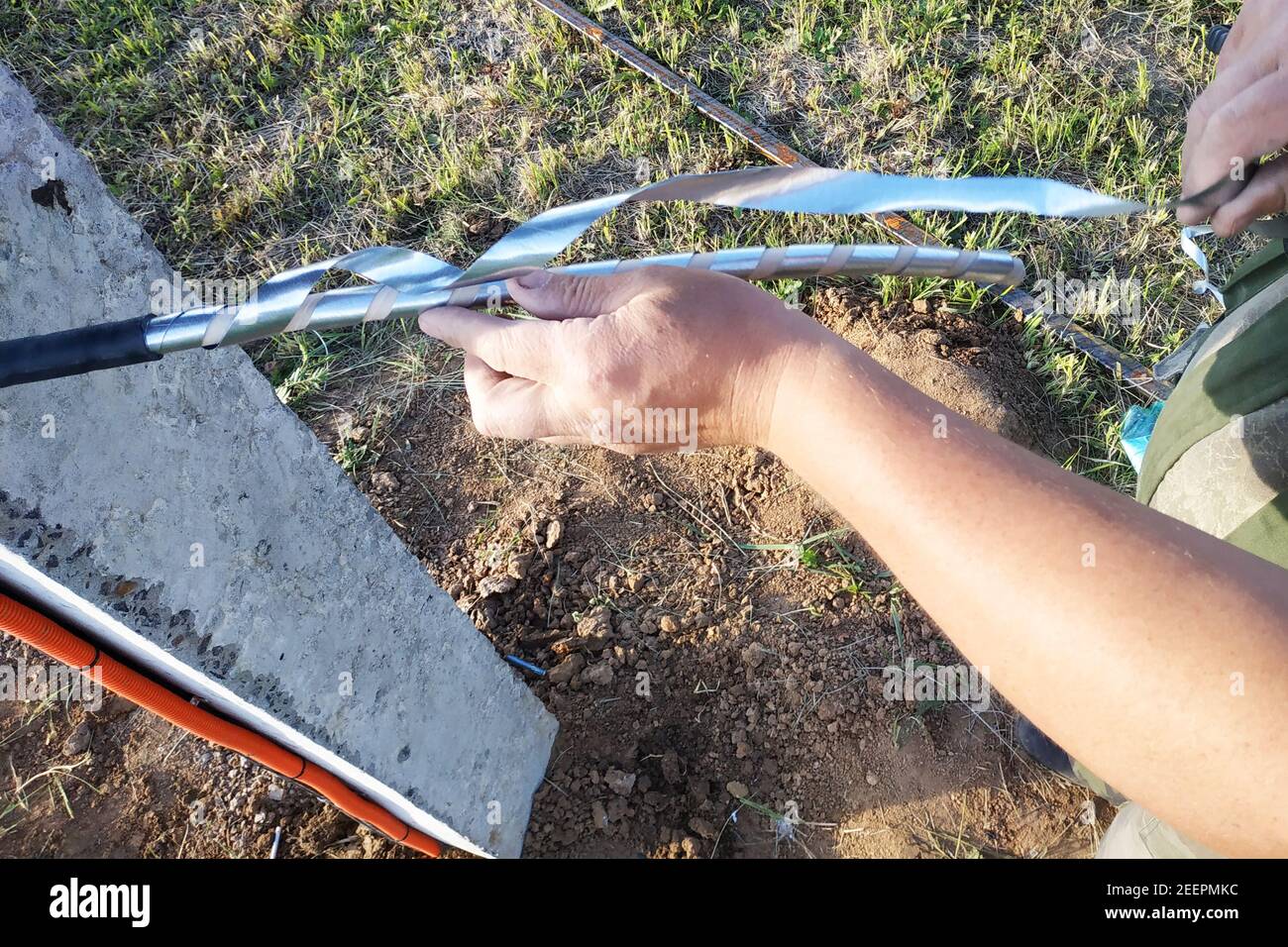 The process of grounding electrical installations and devices, mounting ...
