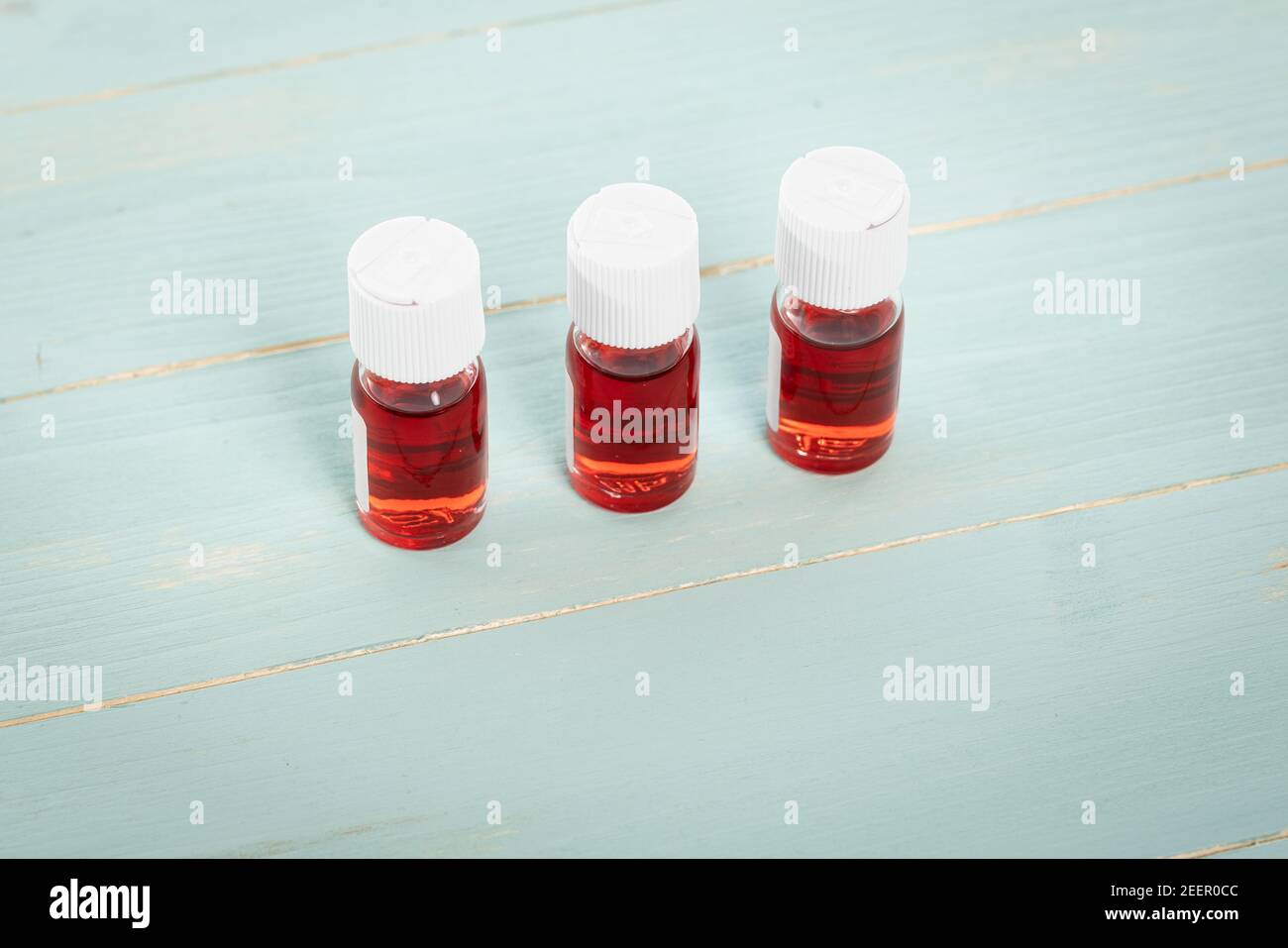 Dna test with vials of green liquid hi-res stock photography and images ...