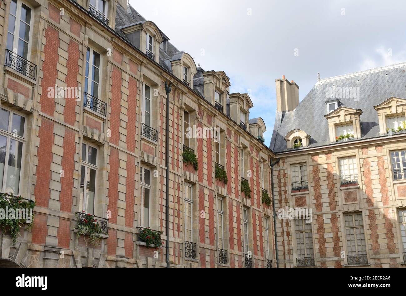 Red brick residential building in traditional architecture, Paris ...