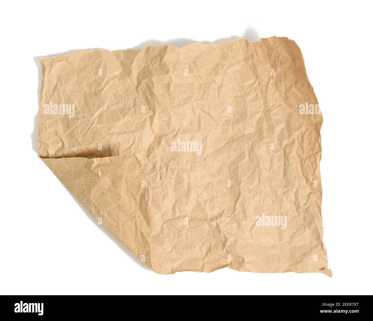 piece of brown parchment paper with torn edges isolated on white ...