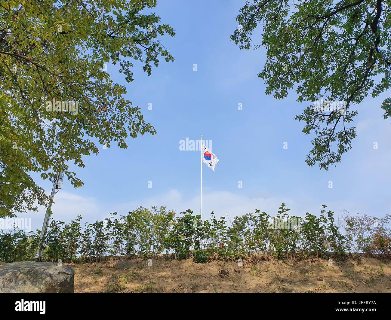 Taegeukgi,the national flag of Korea, in the blue sky Stock Photo - Alamy
