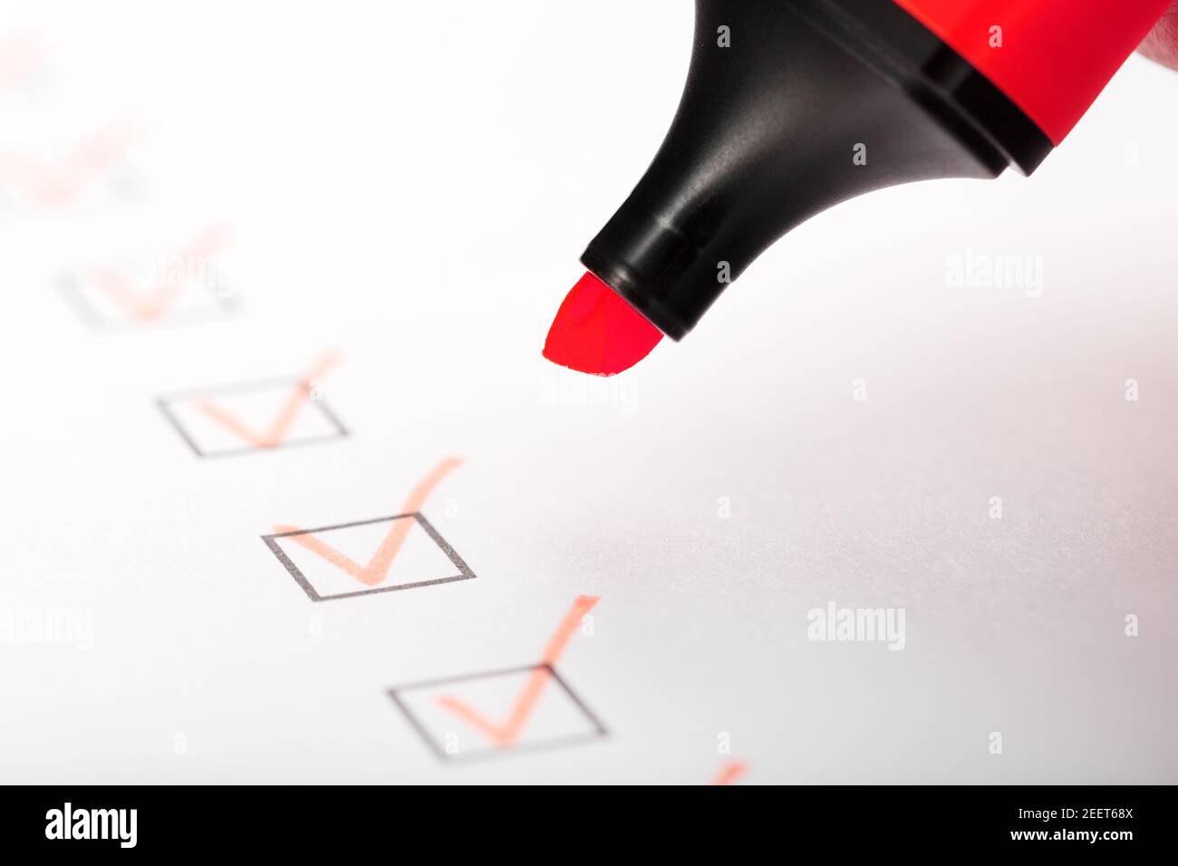 Orange marker with markers on the checklist sheet. Checklist completed ...