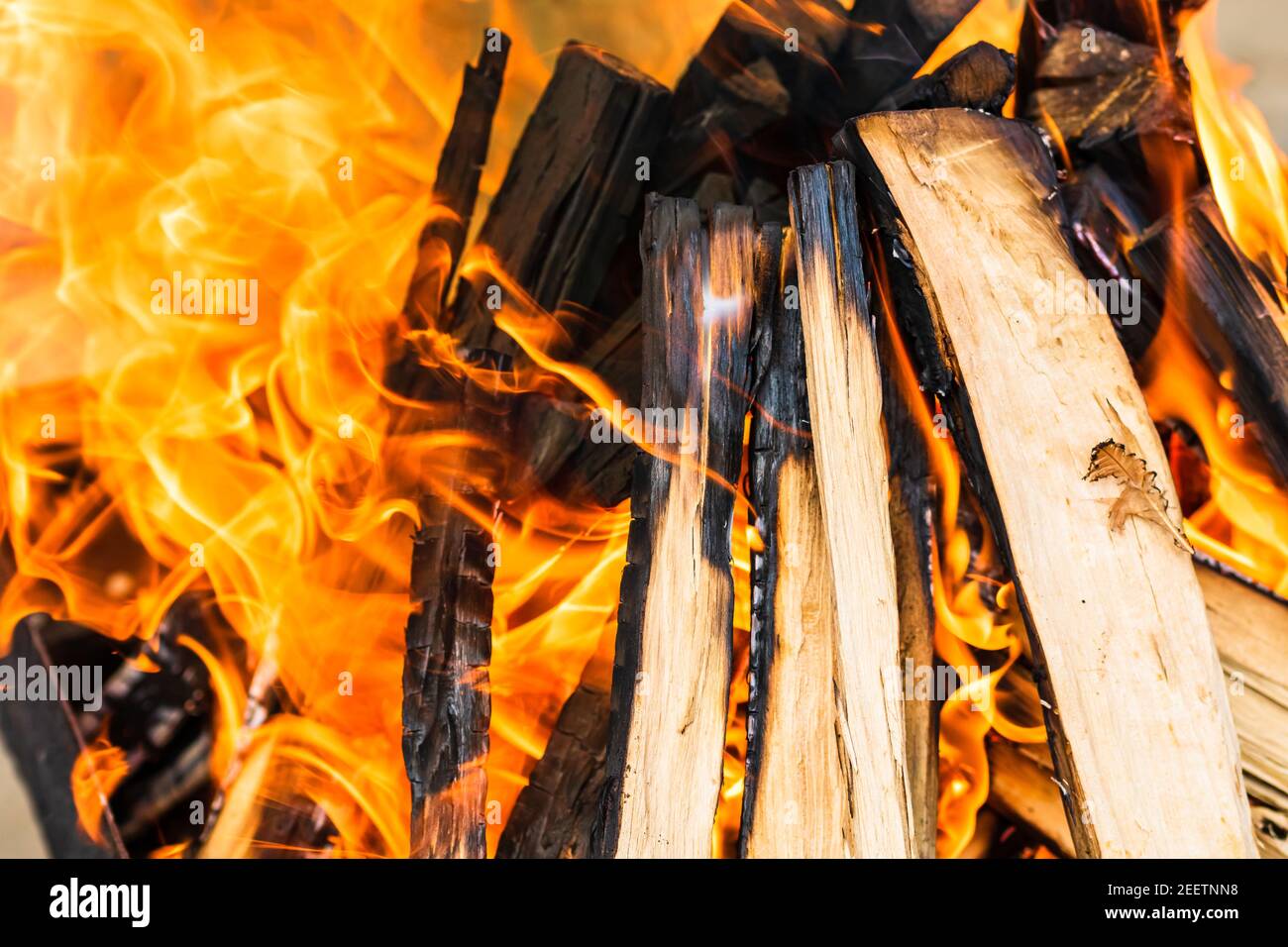 Burning wood chips forming coal. Barbecue preparation, fire before ...