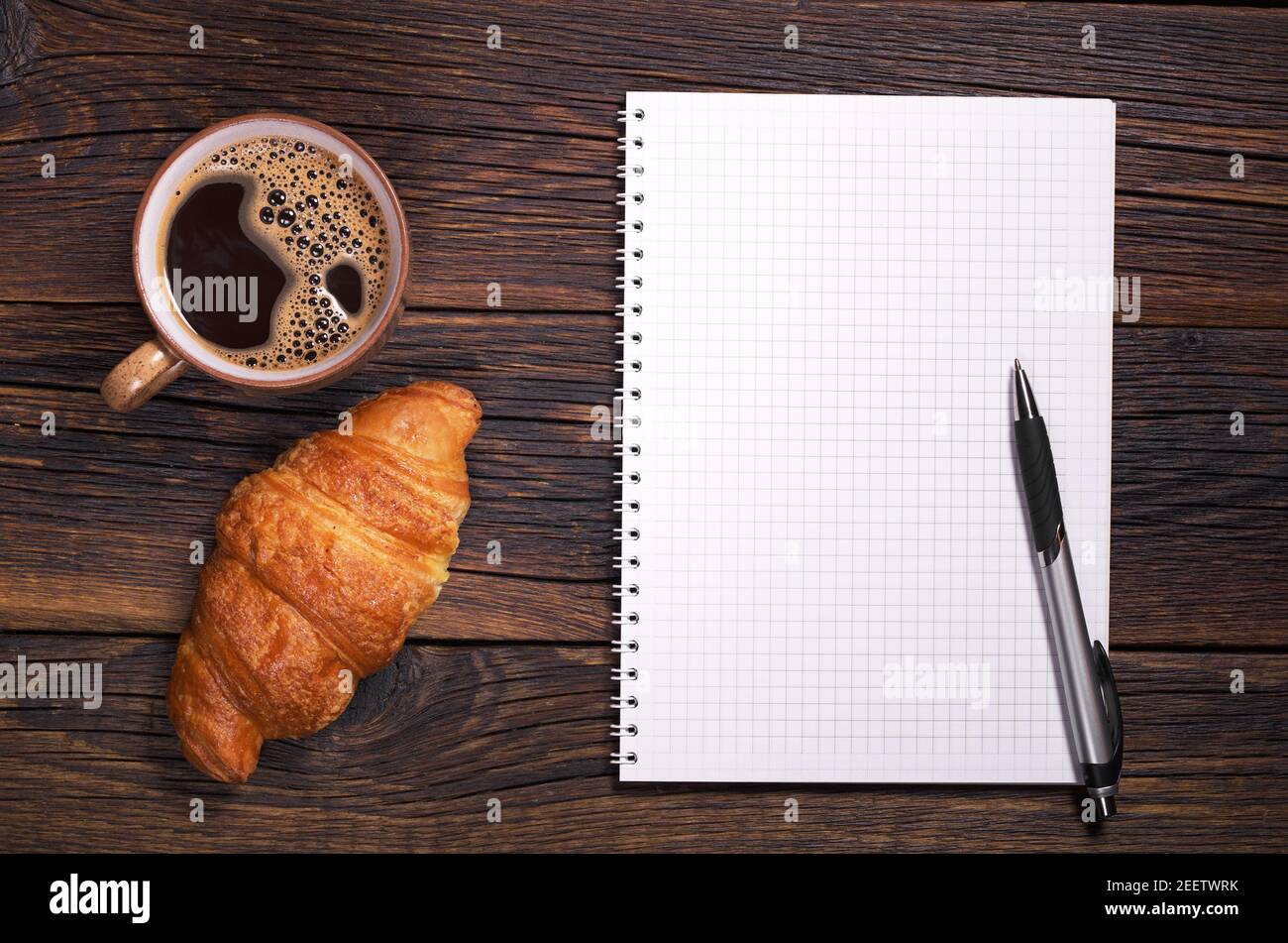 Cup coffee croissant notebook hi-res stock photography and images - Alamy