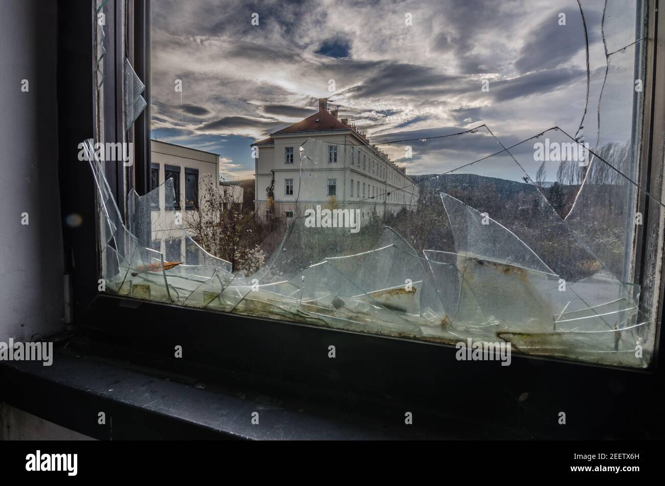 view through broken window on barracks Stock Photo - Alamy