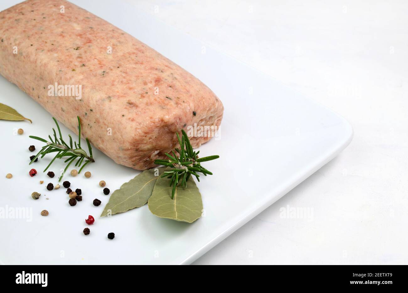 Raw meatloaf on white background. Top view. Copy space Stock Photo - Alamy