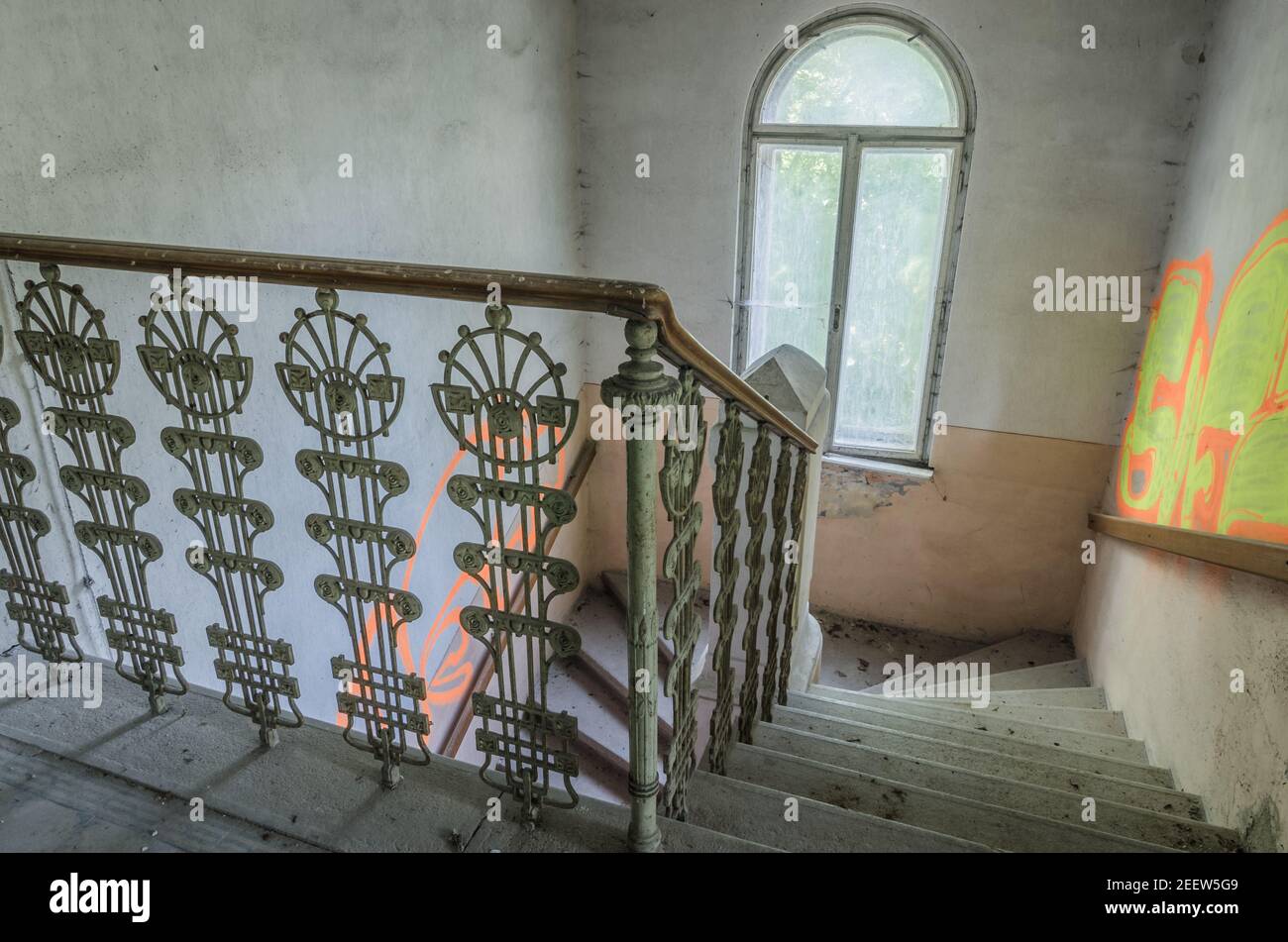 staircase and forged railing of iron Stock Photo - Alamy