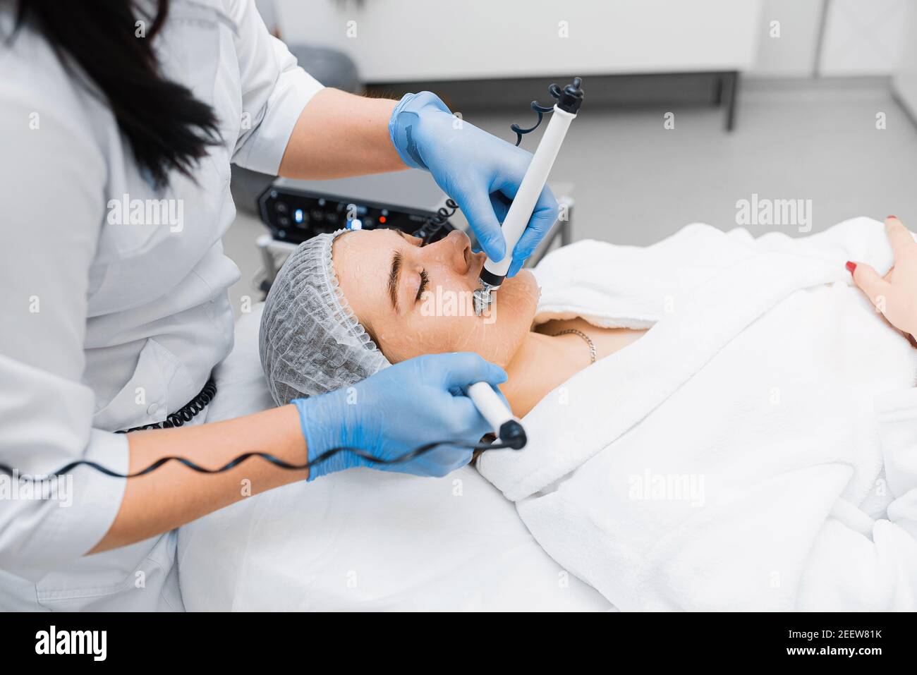 Microcurrent therapy procedure for facelift in a cosmetology clinic ...