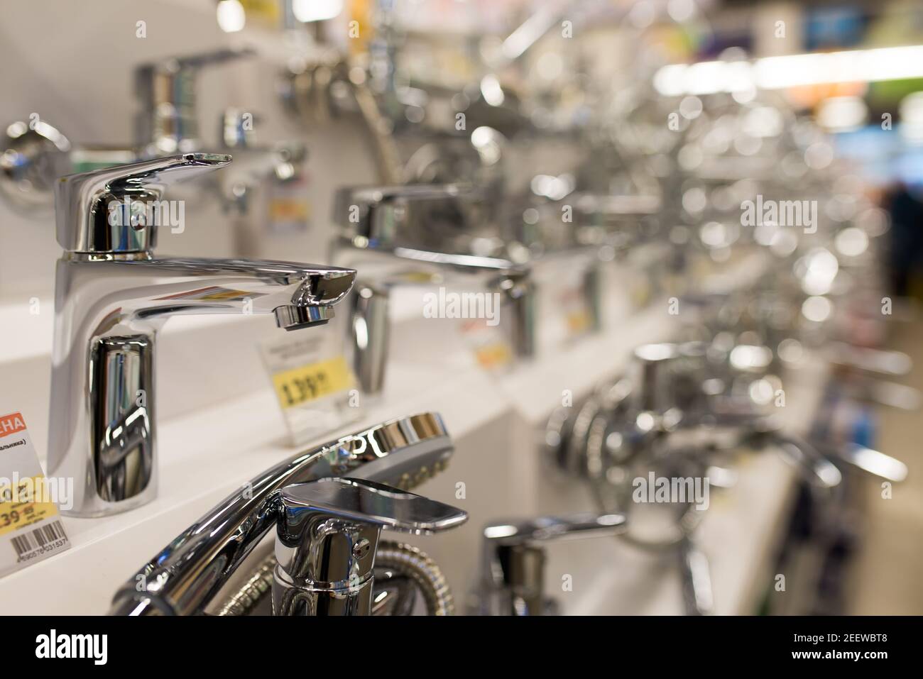 Various new faucets in construction store Stock Photo - Alamy