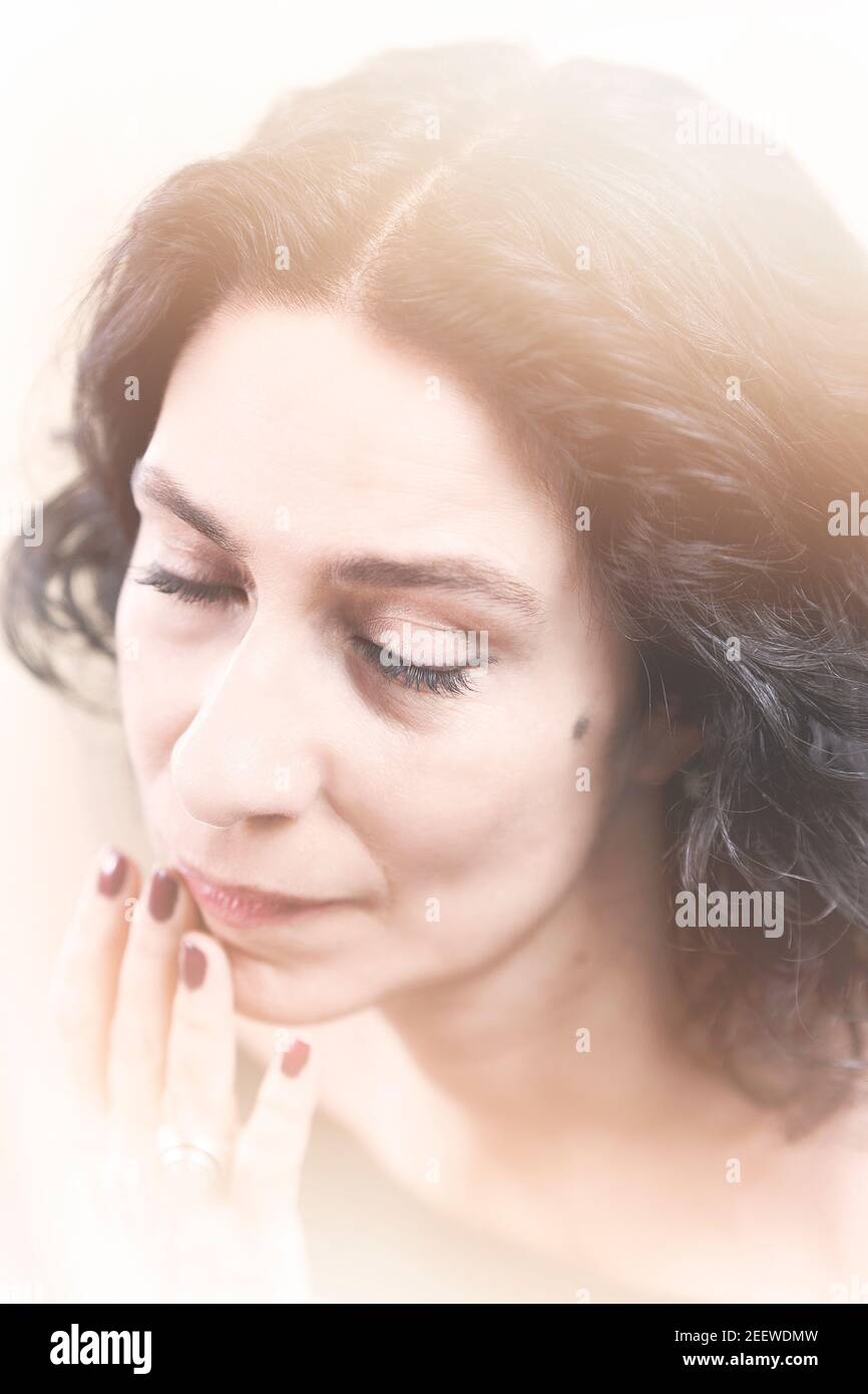 woman with sad and melancholic expression Stock Photo - Alamy